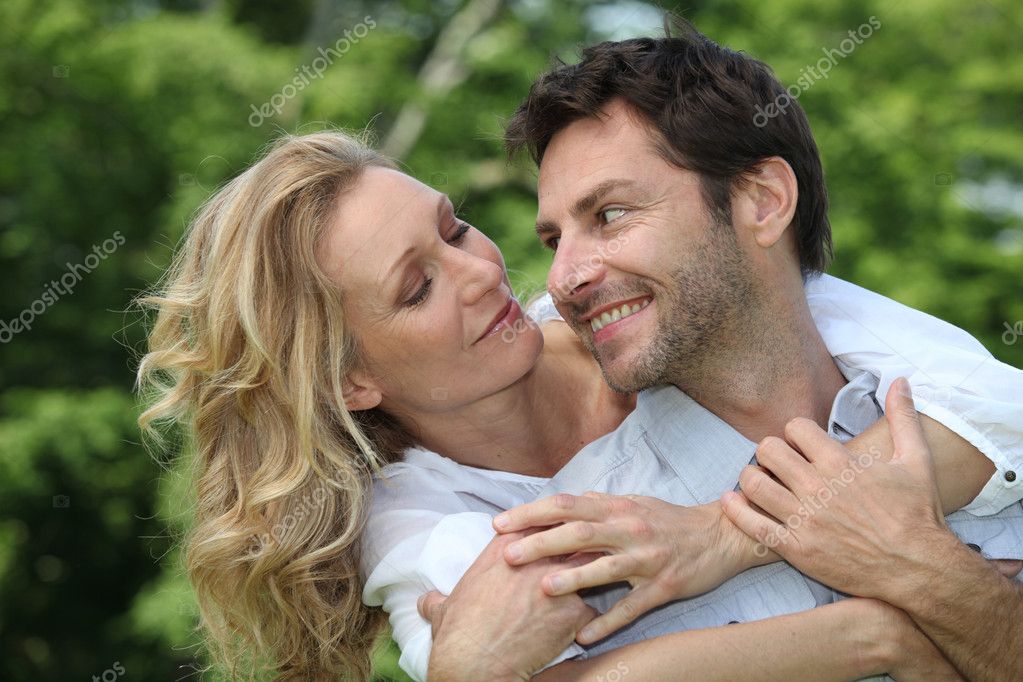 Blonde woman hugging man from behind — Stock Photo © photography33 #9315959 Blonde woman hugging man from behind — Stock Photo © photography33 #9315959