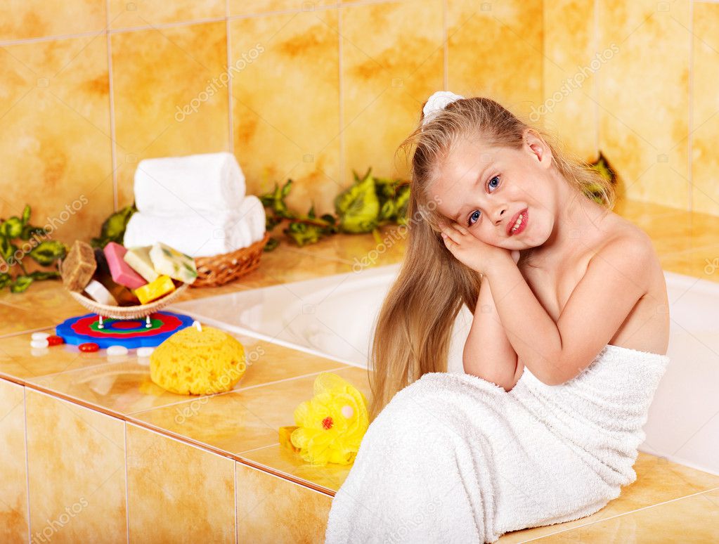 Child washing in bubble bath . — Stock Photo © poznyakov #9497783