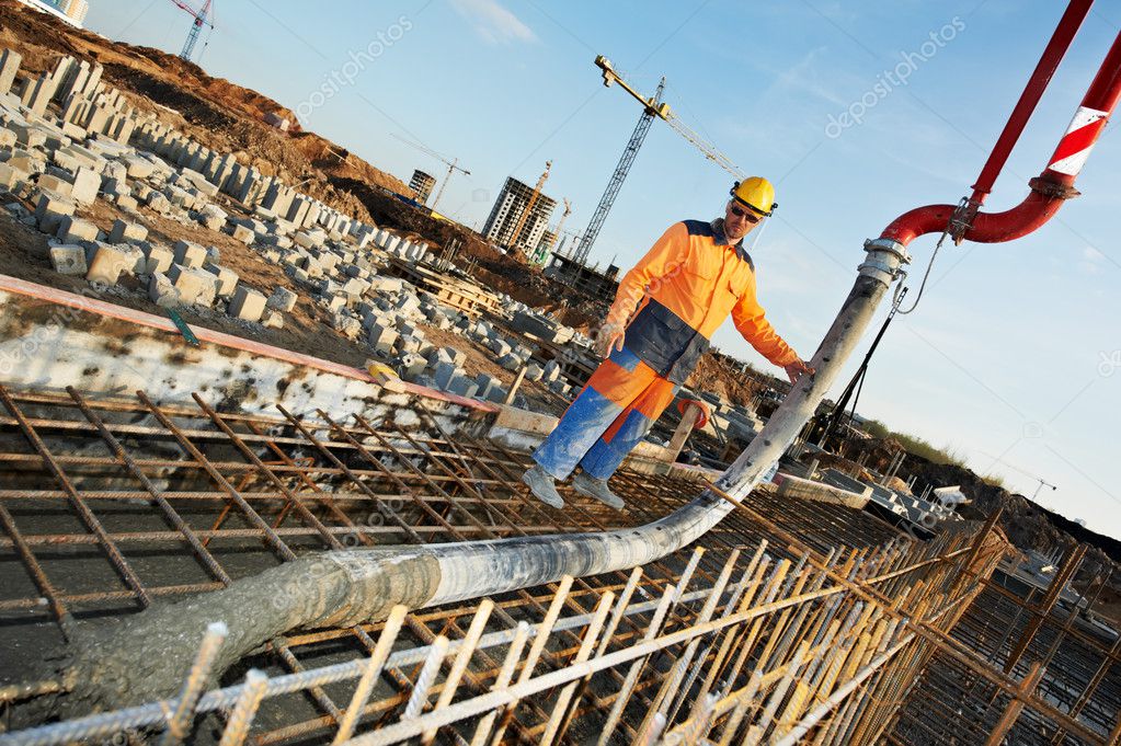 Builder worker at concrete pouring work — Stock Photo © kalinovsky ...