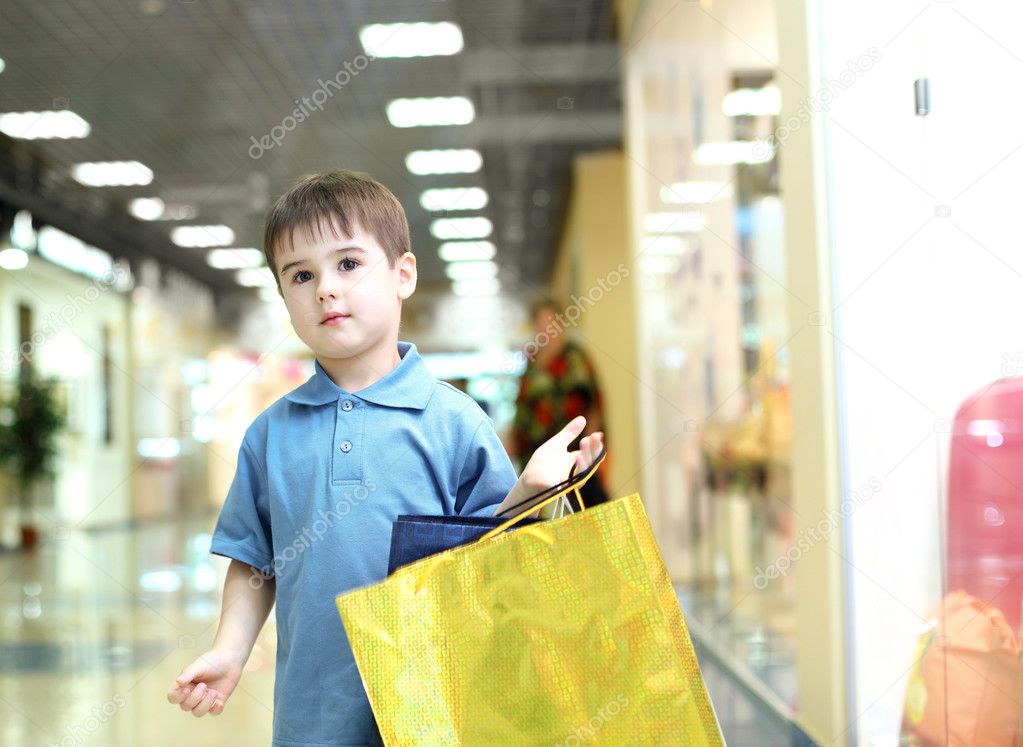 Little boy doing shopping — Stock Photo © SergeyNivens #9574341