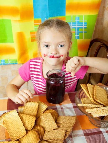 Girl eating cherry jam Pictures, Girl eating cherry jam Stock Photos ...