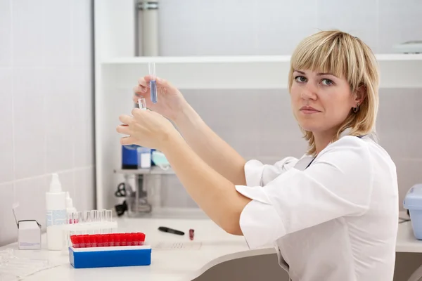 Doctor with test tube - Stock Image - Everypixel