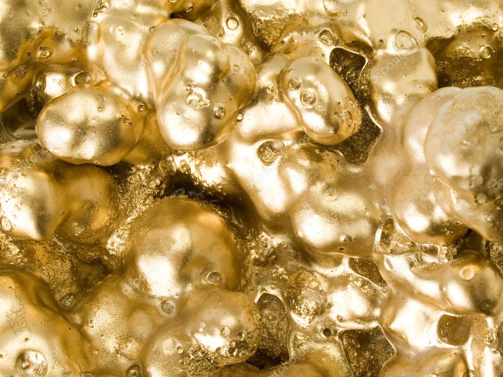 Gold texture closeup background. Stock Photo by ©Leonardi 9679317