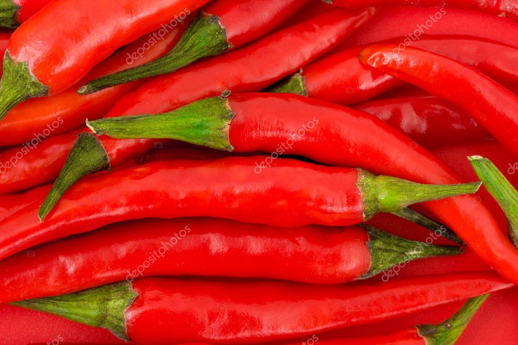 Red hot chili pepper background Stock Photo by ©Violin 9719258