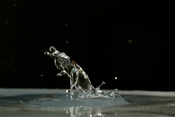 Water drop falling and colliding Stock Photo by ©trancedrumer 10073667