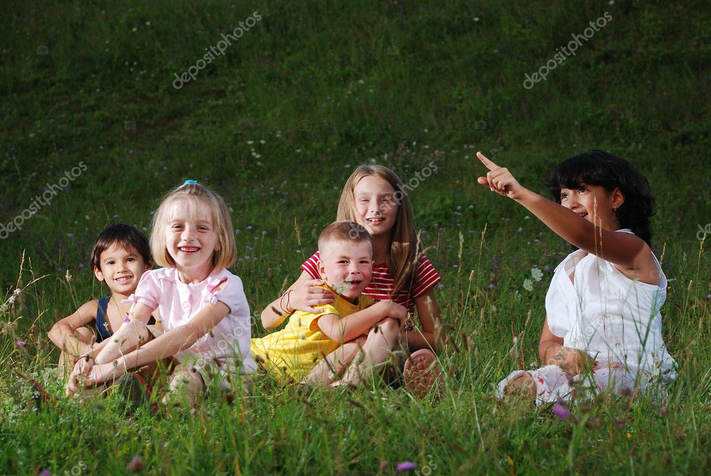 Small happy little group of children outdoor — Stock Photo © zurijeta ...