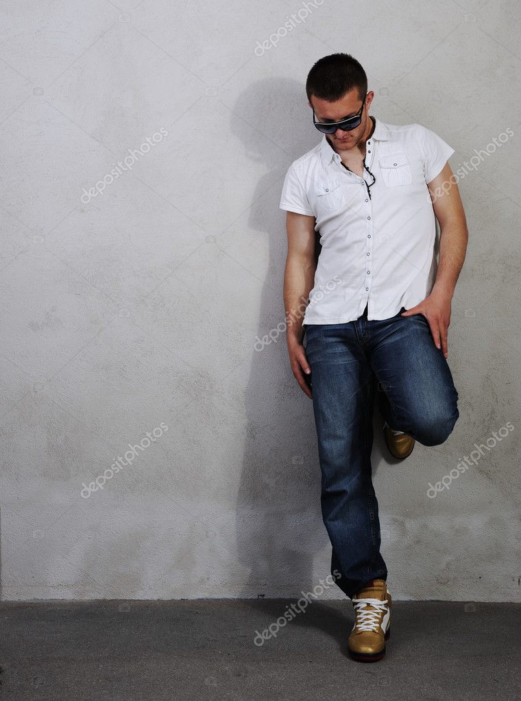 Young macho man in different poses, series of photos — Stock Photo ...