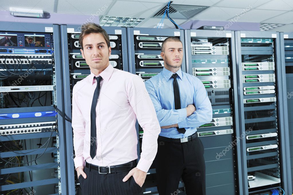 It enineers in network server room — Stock Photo © .shock #7965105 It enineers in network server room — Stock Photo © .shock #7965105