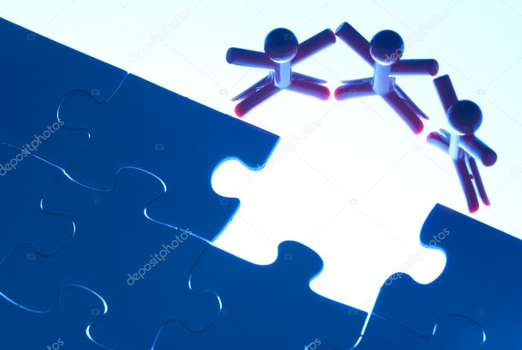 Team work on solving puzzle problem — Stock Photo © Ansonde #8385737