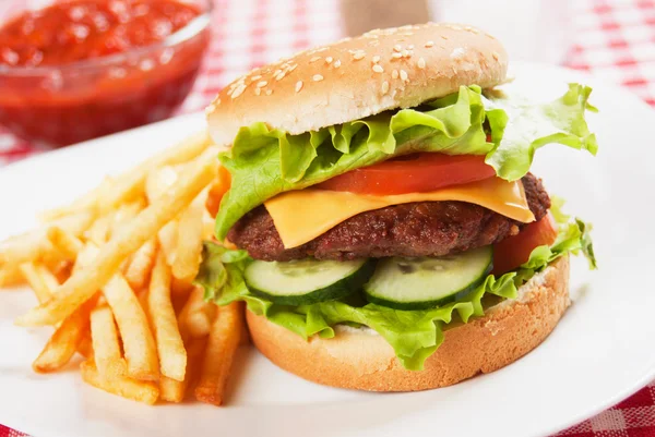 Classic hamburger with french fries — Stock Photo © igordutina #12050059