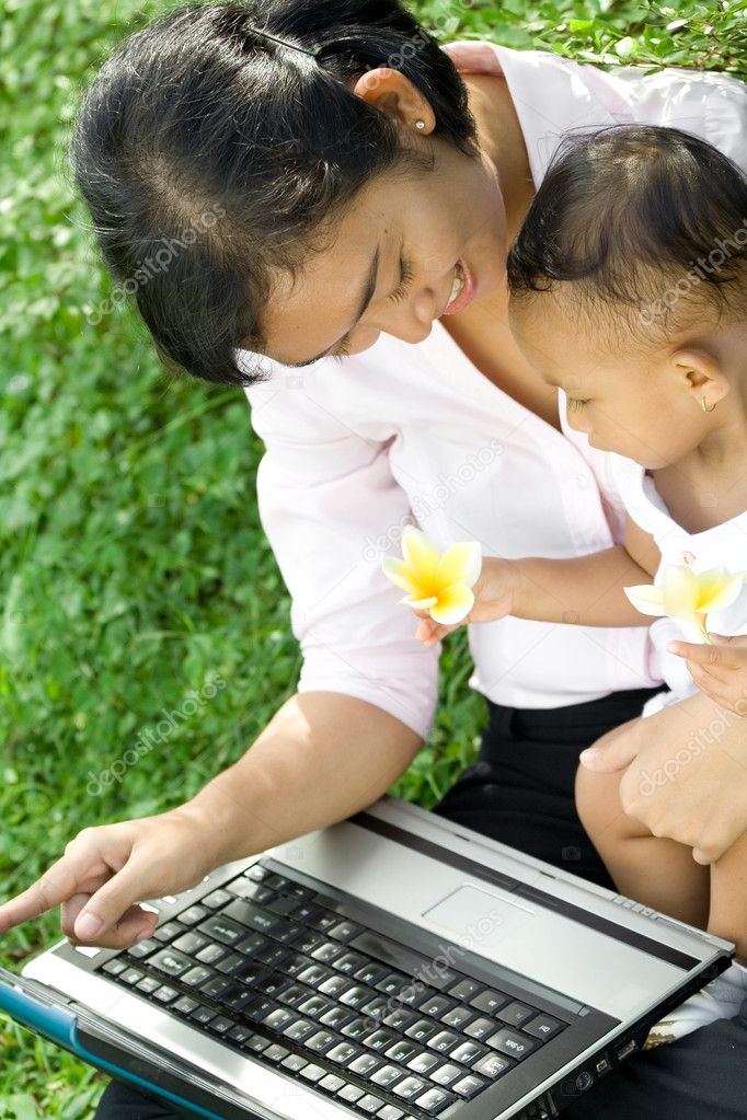 Mother educate baby using computer Stock Photo by ©ampyang 9127396