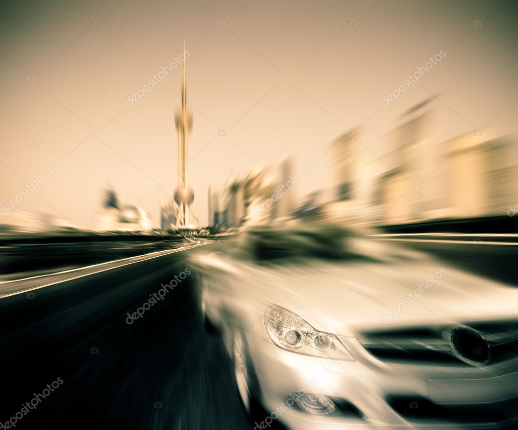 Fast car moving from a modern city.the background with the landmark of ...