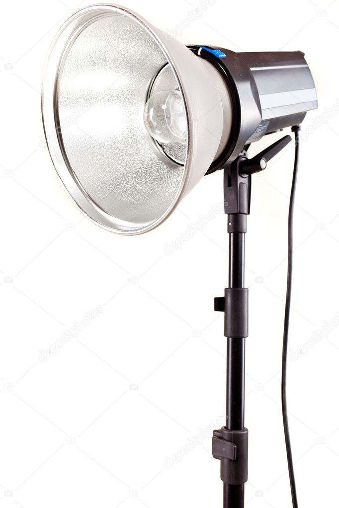 Studio monoblock flash light on tripod isolated on white background ...