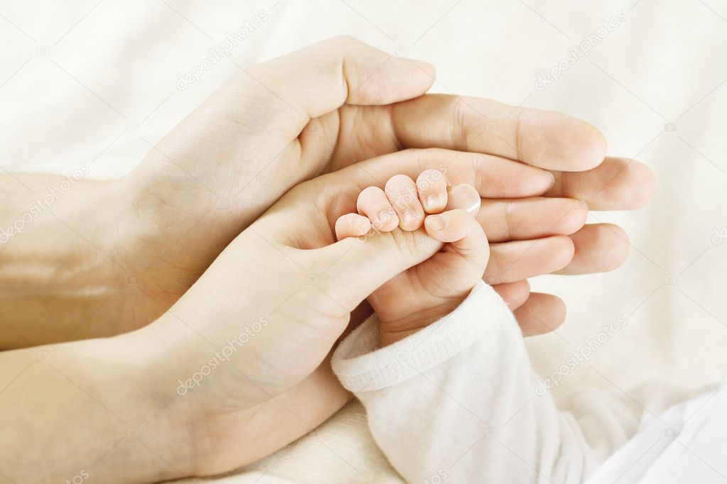 Family, baby hand inside parents hands — Stock Photo © inarik #8995377