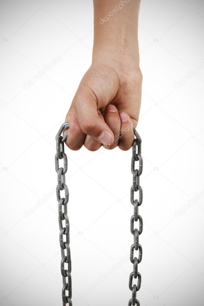 Young boy's hand holding a chain — Stock Photo © vjotov #9377440
