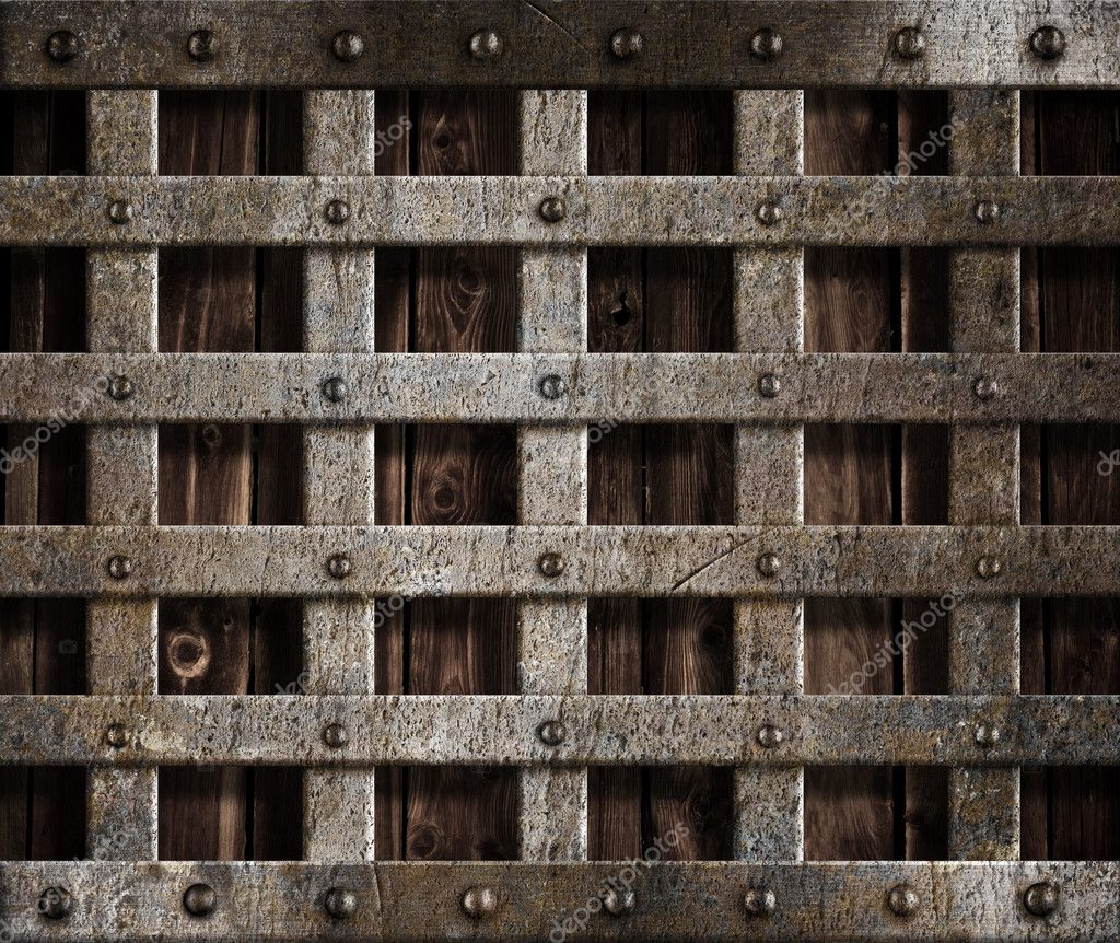 Metal cage on wood background Stock Photo by ©Andrey_Kuzmin 8814887