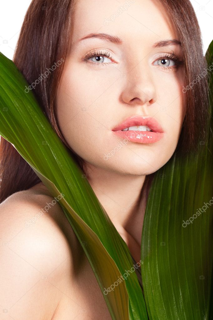Woman portrait with green leaf — Stock Photo © chesterf #9262948