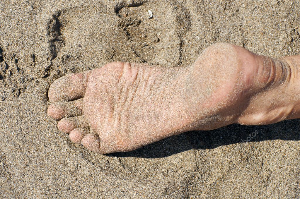 Woman feet in sand Stock Photo by ©Alexis84 8527353