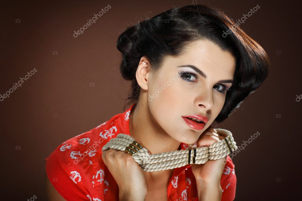 A photo of beautiful brunette is in style of pinup, glamour Stock Photo ...