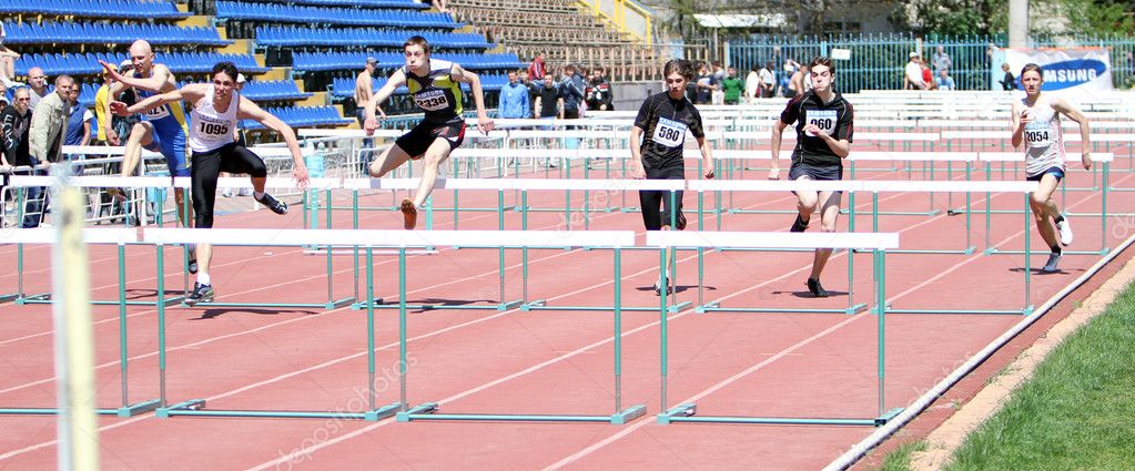 Boys on the 110 meters hurdles race — Stock Editorial Photo ...
