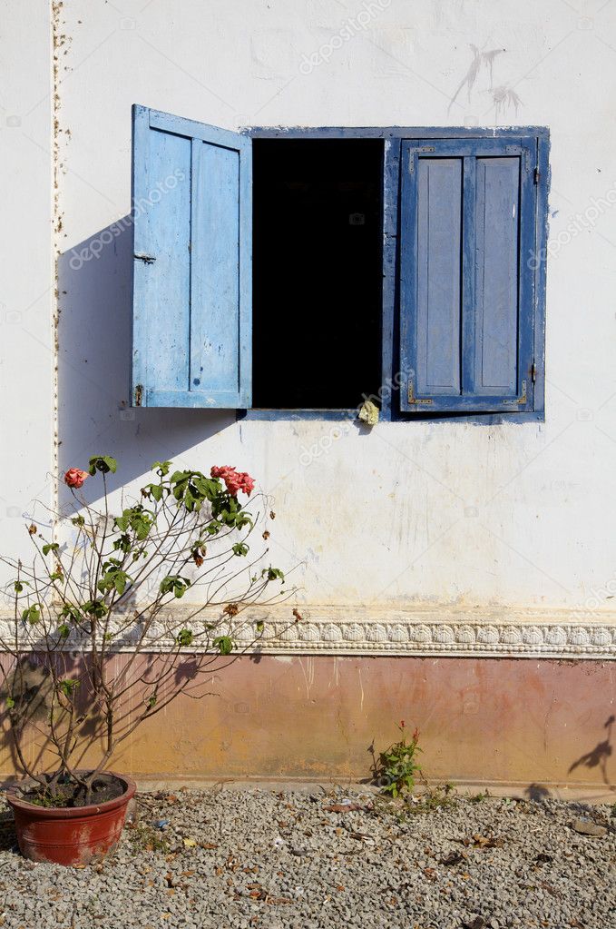 Blue Shutter Window on White Stucco Wall — Stock Photo © sbures #8900255