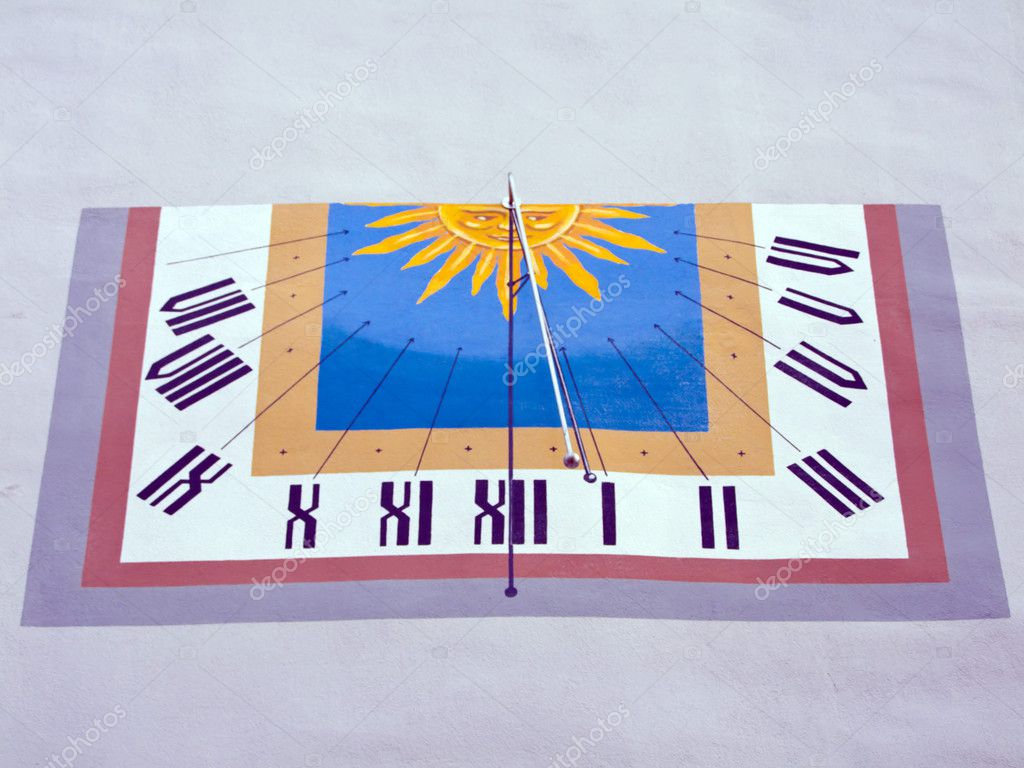Sundial on a building facade Stock Photo by ©ginasanders 8321674