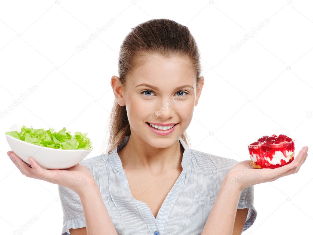 Pretty young woman choice salad or cake. Isolated — Stock Photo ...
