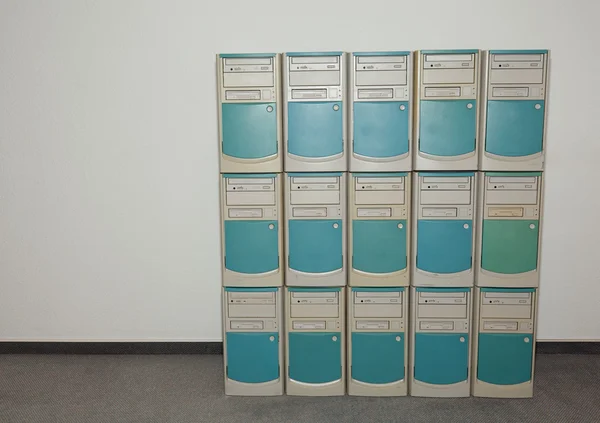 Shelves with boxes, folders and green plant — Stock Photo ...