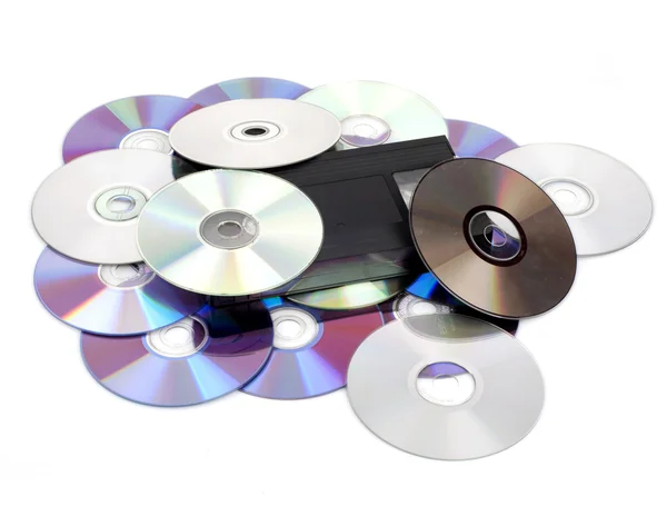 CD vs VHS. VHS cassette lay on the many CD disks isolated on whi Stock ...