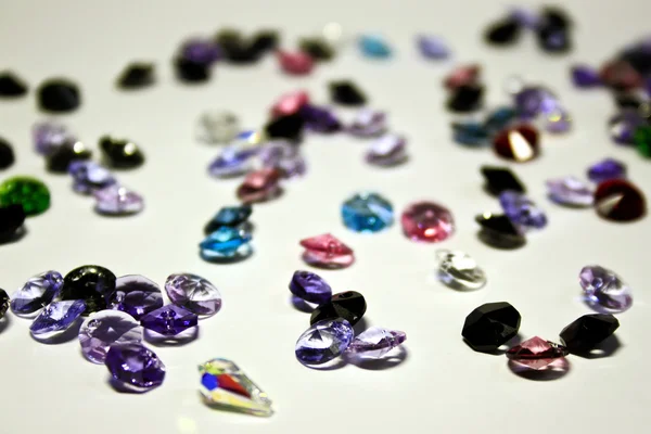 Many jewel stones over white background - Stock Image - Everypixel