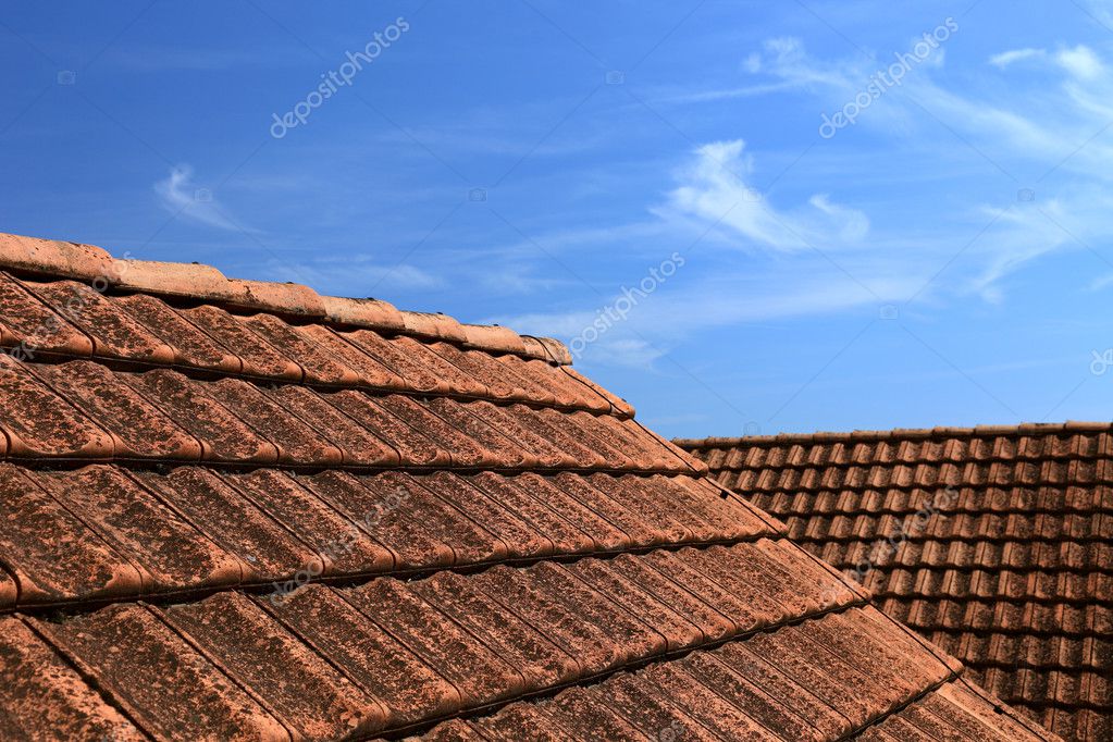 Old tiled roof and beautiful blue sky. Abstract photo as backgro Stock ...