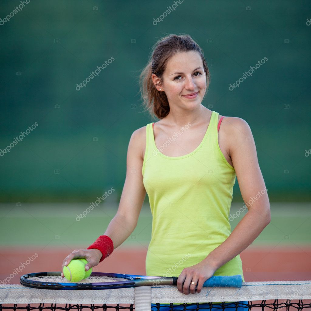 Pretty, young female tennis player on the tennis court — Stock Photo ...