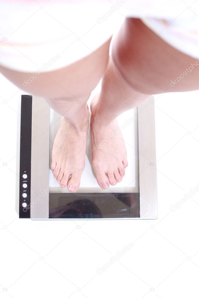 Legs on scales — Stock Photo © yellow2j #8941969