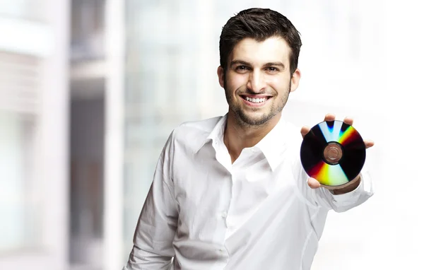 Man holding cd Stock Photo by ©Krakenimages.com 10178036