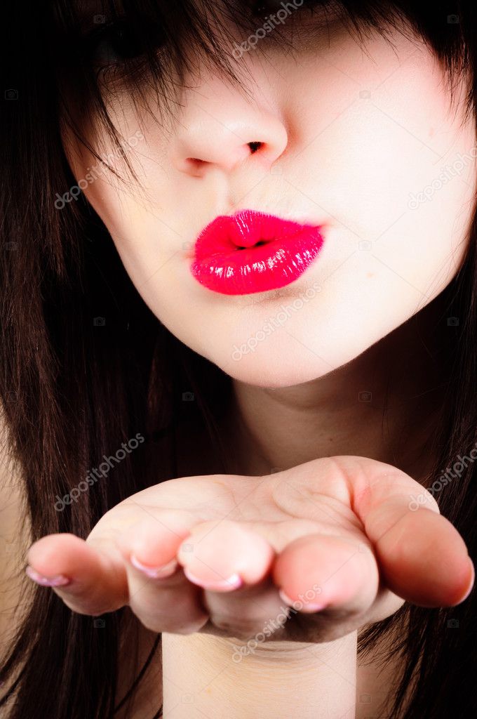 Beautiful young girl throwing a kiss at you — Stock Photo © svedoliver ...