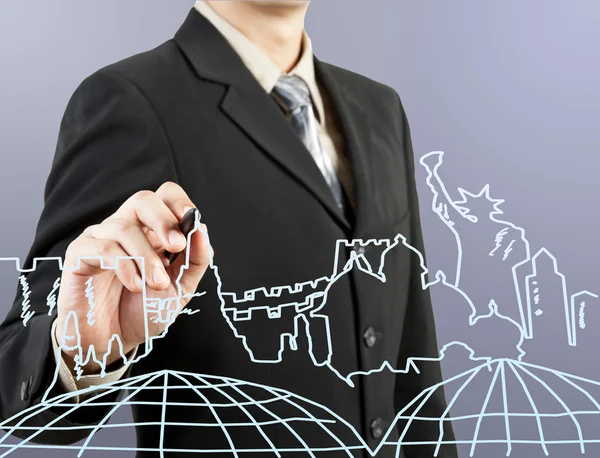 Businessman hand drawing the dream travel around the world - Stock ...