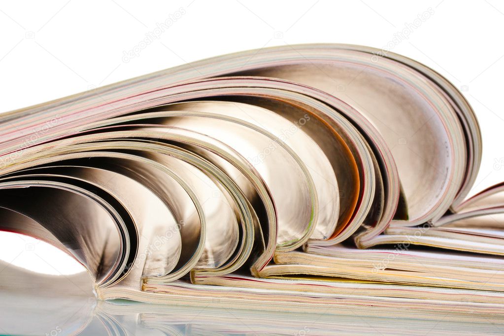 Open magazines isolated on white Stock Photo by ©belchonock 8113039