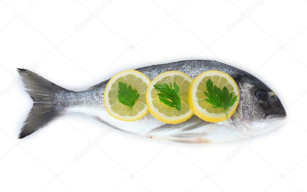 Fresh fish with lemon and parsley isolated on white — Stock Photo ...