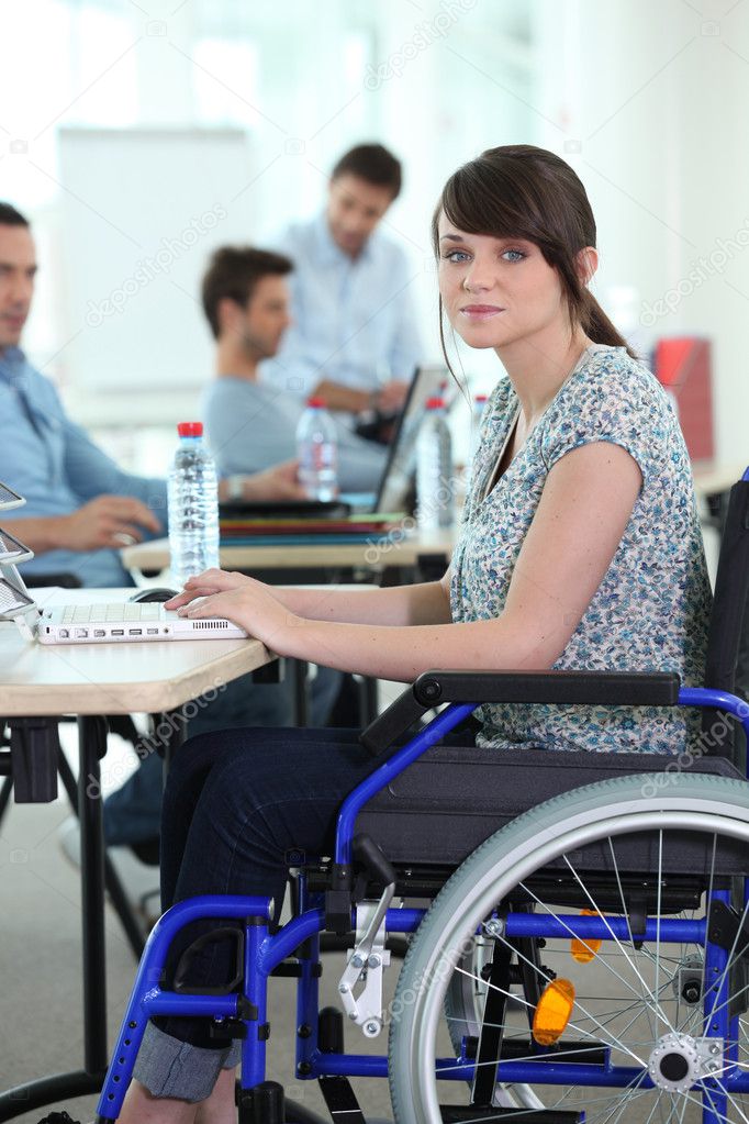 Young woman disabled at work — Stock Photo © photography33 #10346259