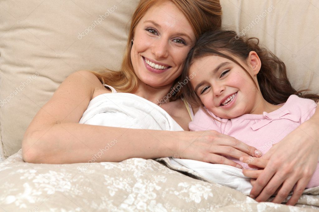 Mother and daughter in bed together Stock Photo by ©photography33 10499375