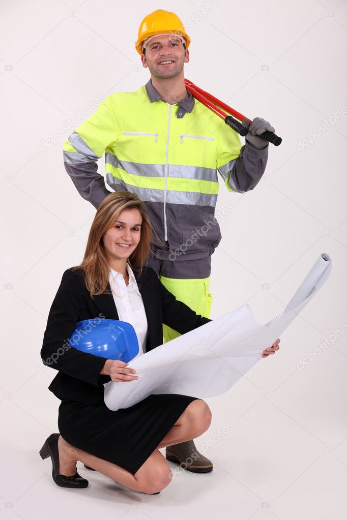 Tradesman and engineer standing side by side — Stock Photo ...