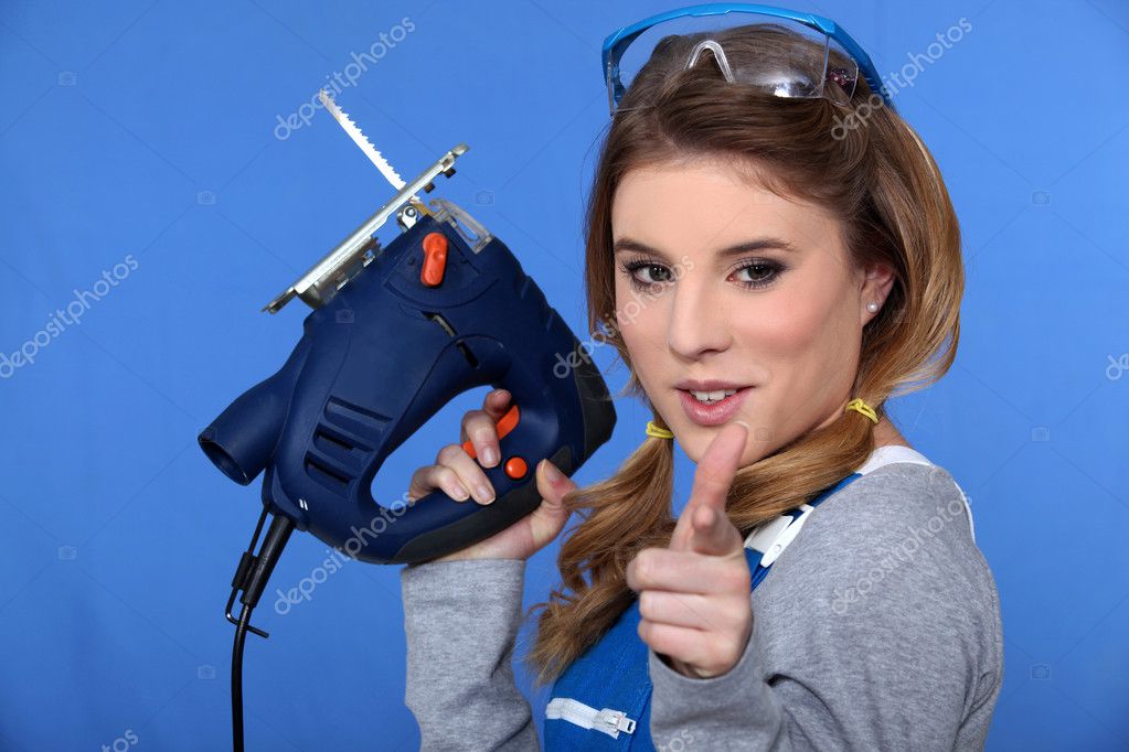 Woman with chain saw — Stock Photo © photography33 #9681612