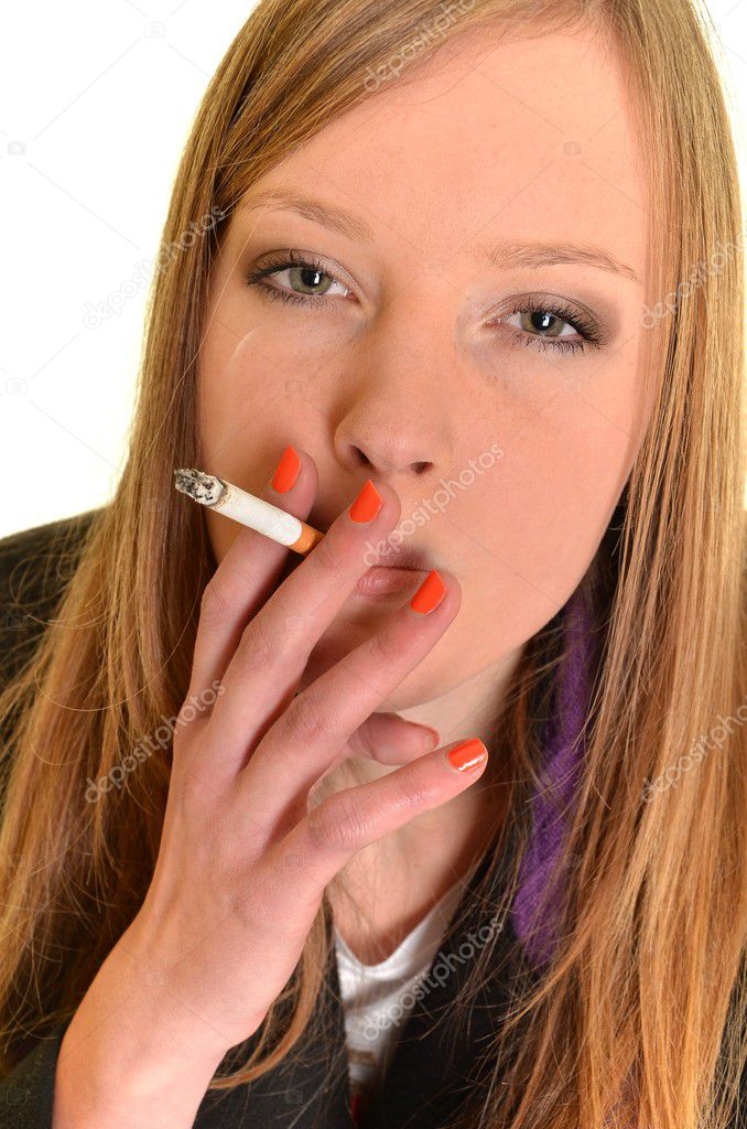 Beautiful woman holding a cigarette — Stock Photo © muro #8974380