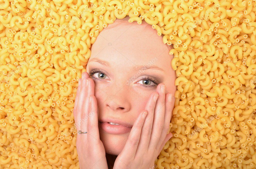 Portrait of a young beautiful woman in pasta — Stock Photo © muro #9403022