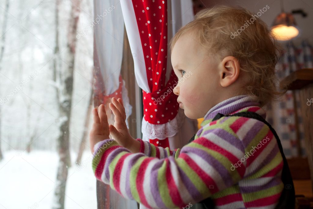 The little girl stands and sees something Stock Photo by ©Dimedrol68 ...