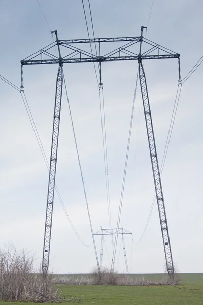 Big power pole in field - Stock Image - Everypixel
