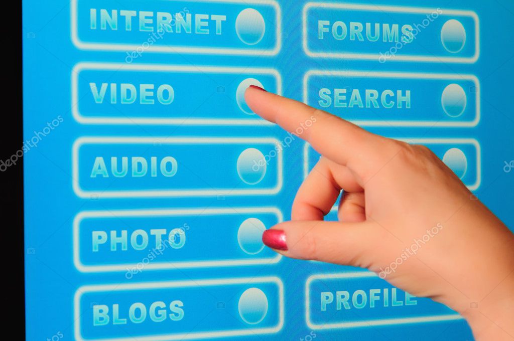 Woman touching a touchscreen by finger — Stock Photo © york_76 #9797677
