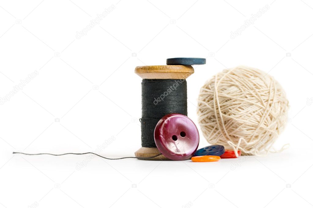 Thread bobbin and buttons Stock Photo by ©Garsya 9013550