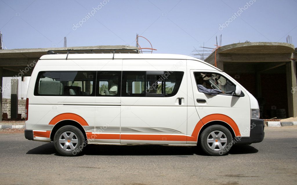 Minivan taxi driving by on a road in dahab, sinai, egypt — Stock Photo ...