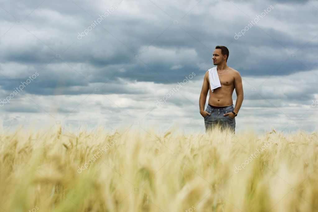 Man in the field before rain — Stock Photo © seven2812 #8238601